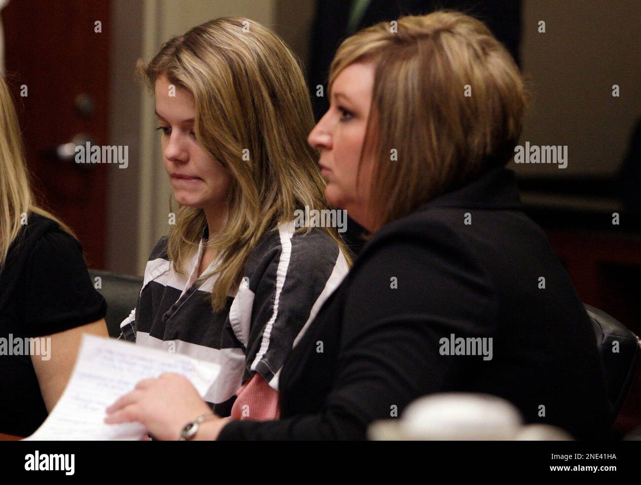 Elizabeth Johnson, left, mother of missing baby Gabriel, sits next to ...