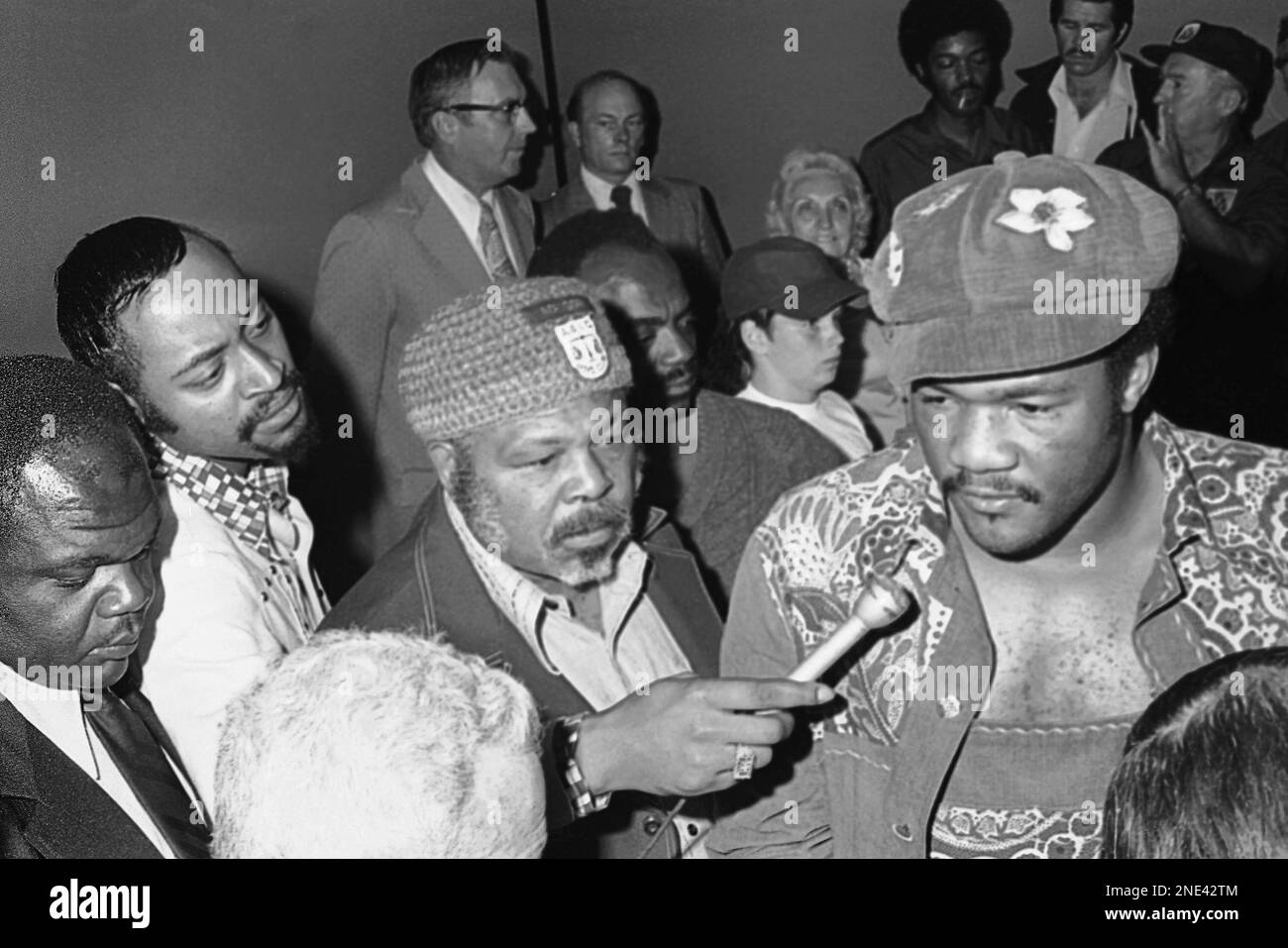Former lightweight and heavyweight champion Archie Moore, left, listens ...