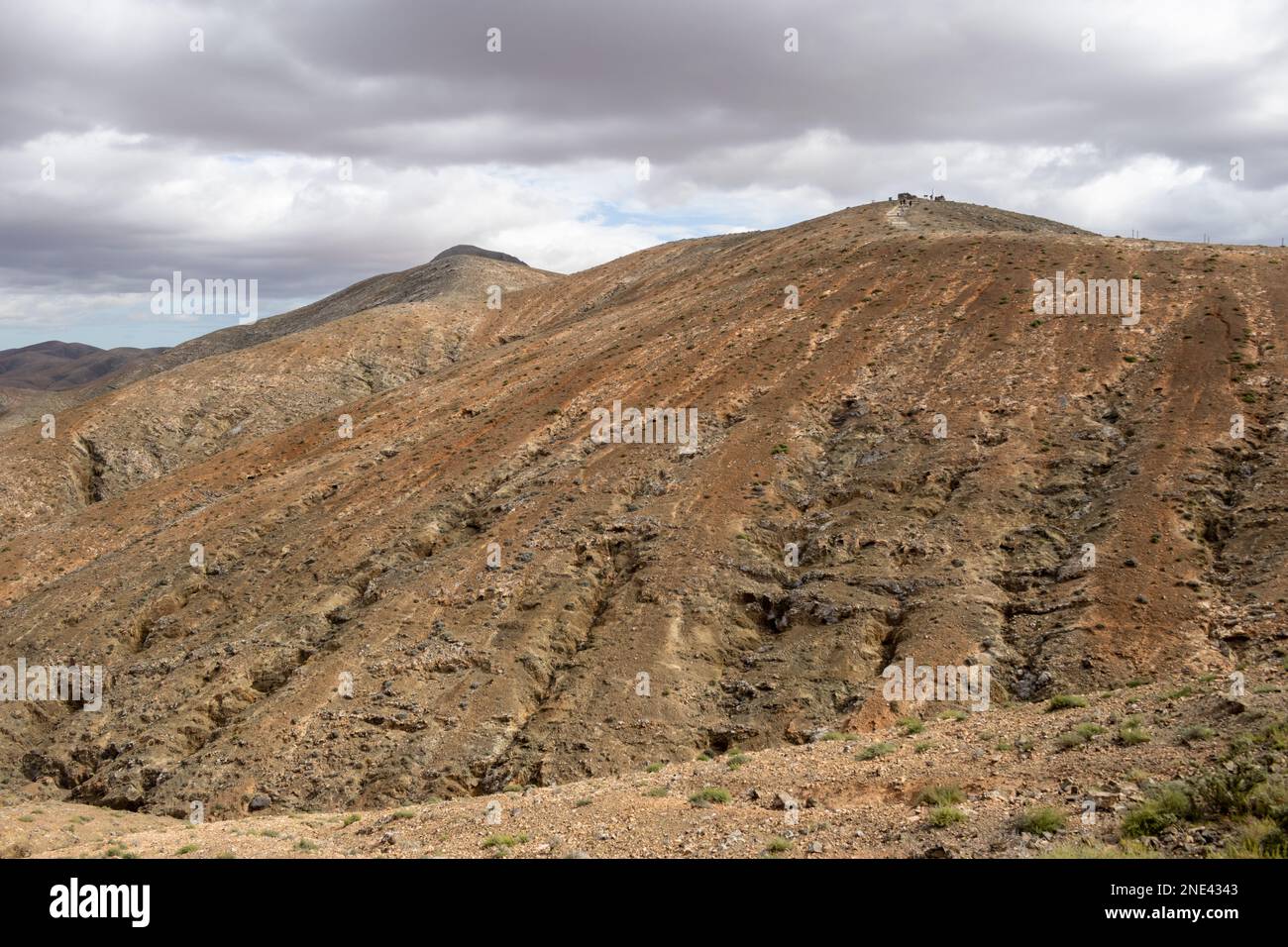 Shapes and lines of the mountains of the volcanic origin. Light brown ...