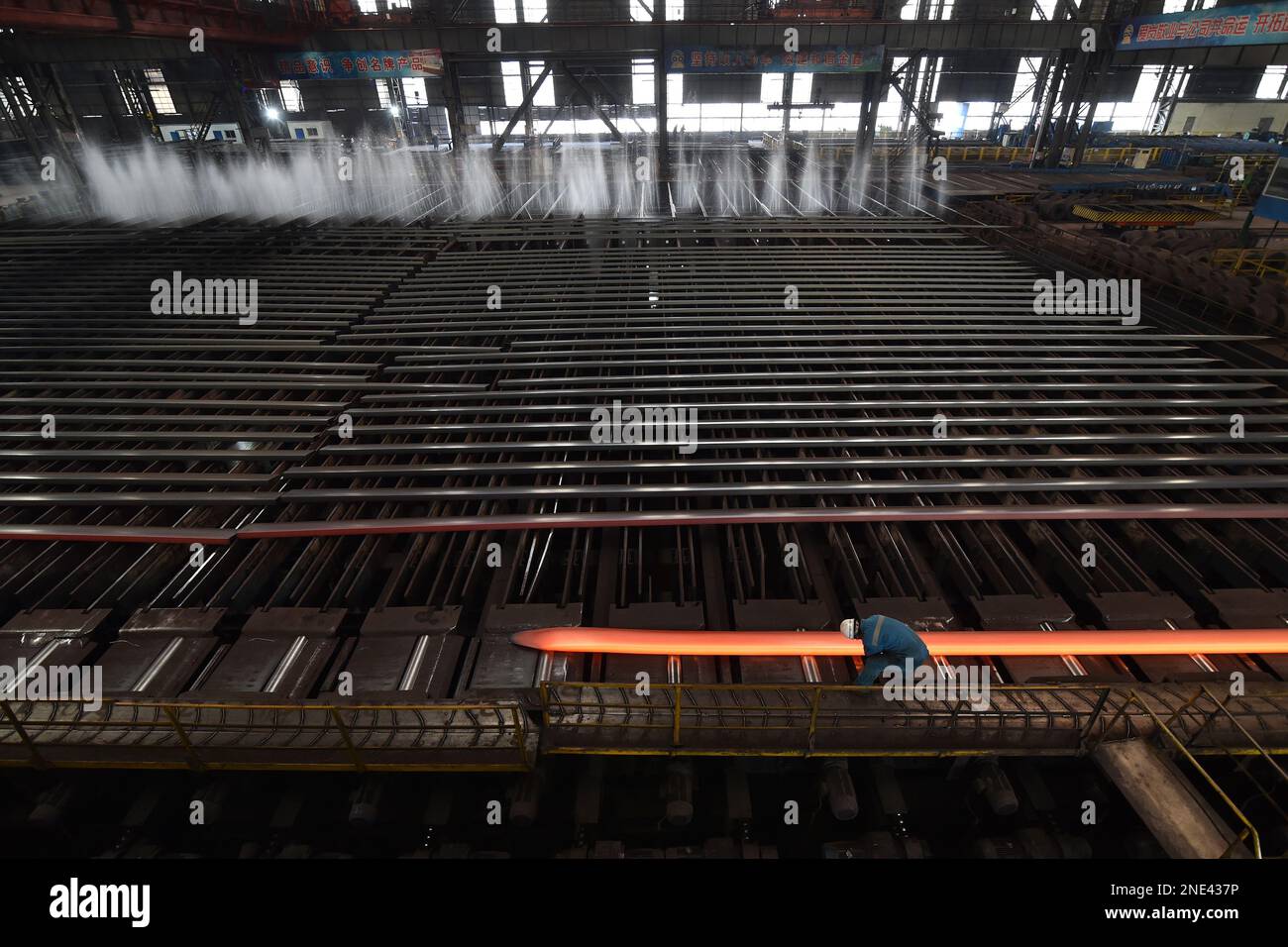 SUQIAN, CHINA - FEBRUARY 16, 2023 - Workers make L-shaped steel at a ...