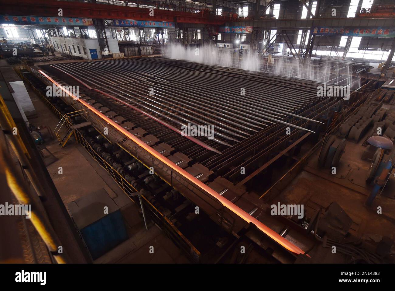 SUQIAN, CHINA - FEBRUARY 16, 2023 - Workers make L-shaped steel at a ...