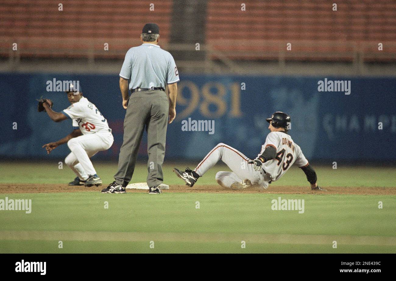 San Francisco Giants pitcher Danny Darwin slides into second base with ...