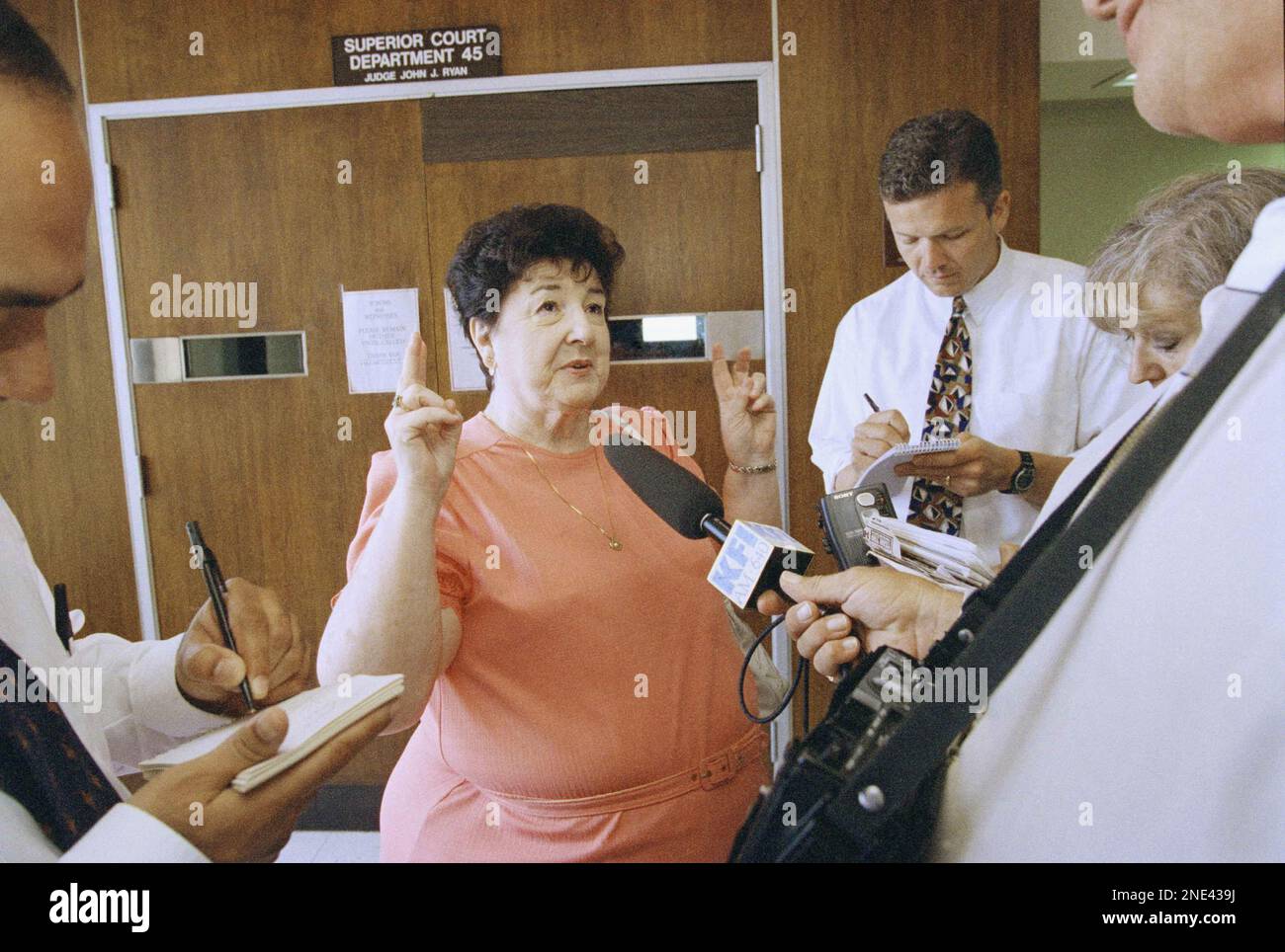 Lola Stapley talks with reporters outside an Orange County Superior ...