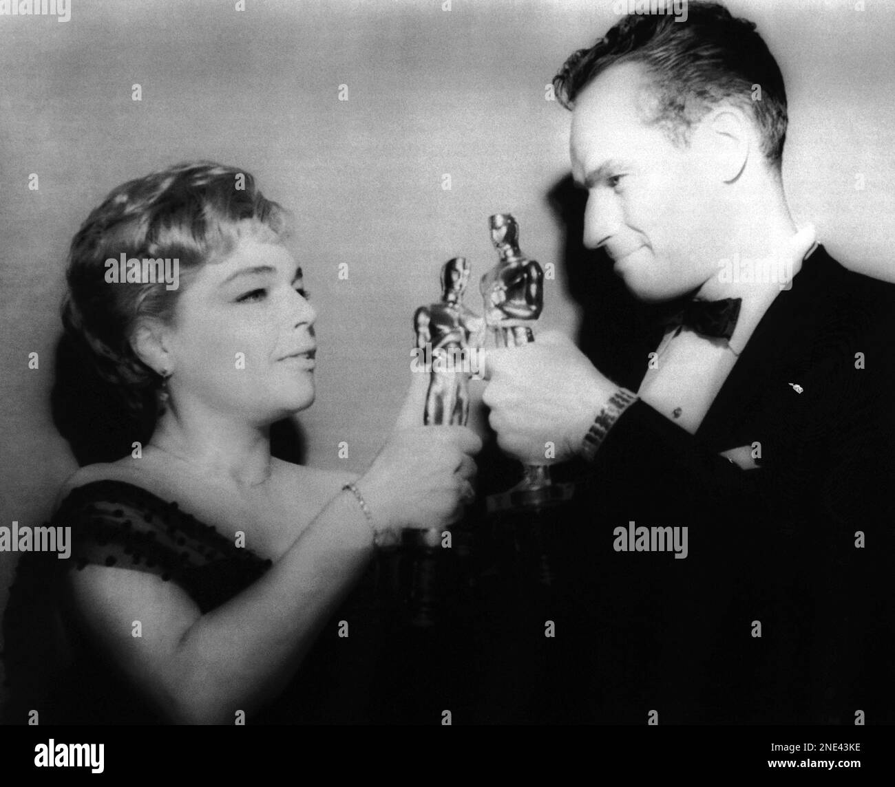 American actor Charlton Heston and French actress Simone Signoret with ...