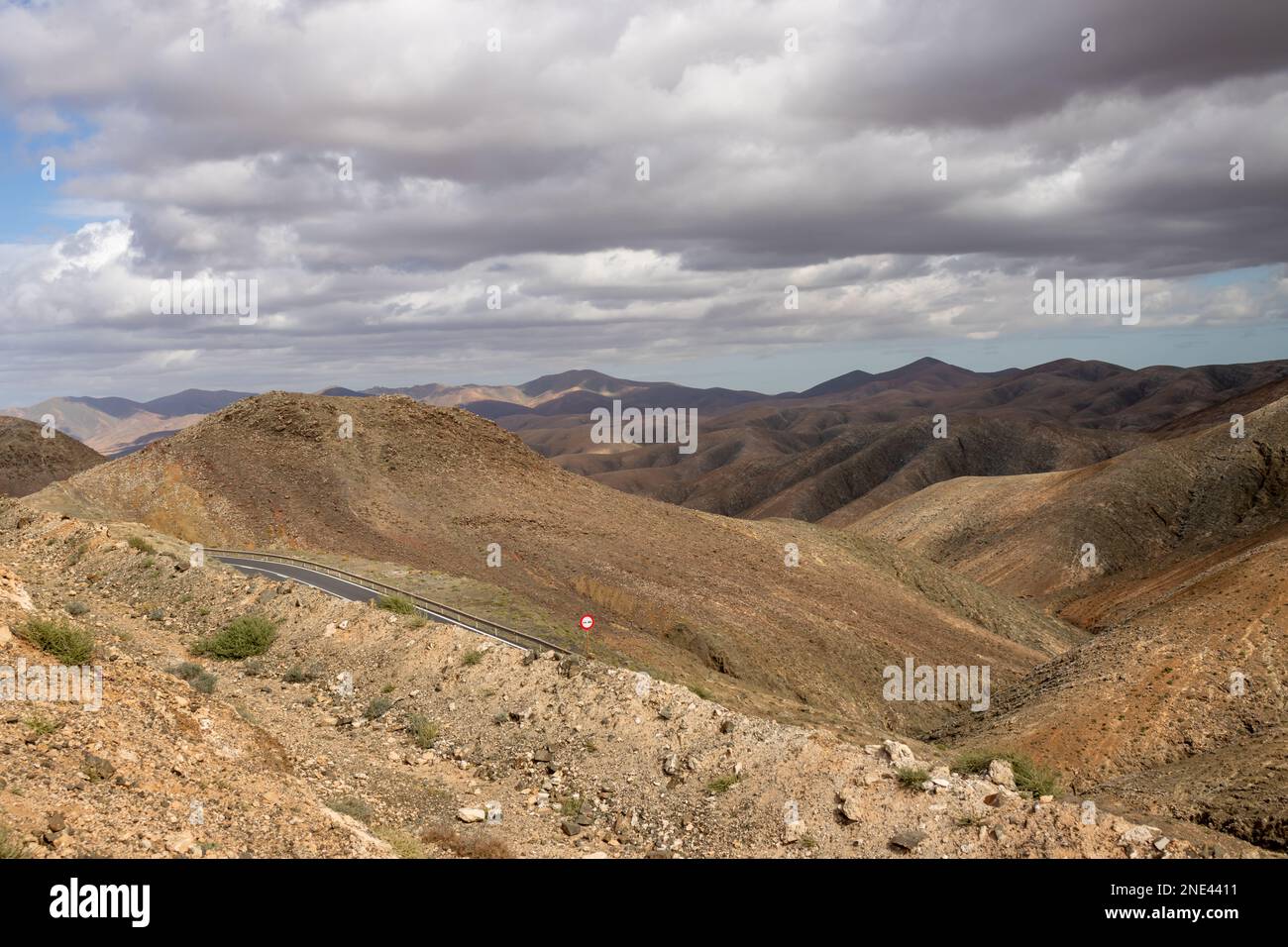 Shapes and lines of the mountains of the volcanic origin. Light brown ...