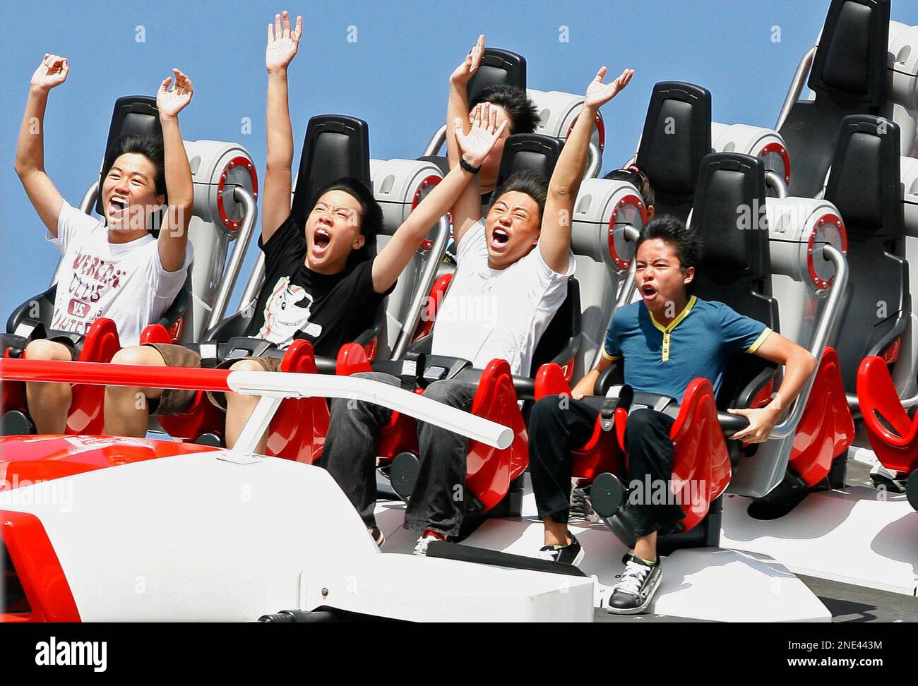 Visitors to newly-opened Resorts World Sentosaon in Singapore enjoy a ...