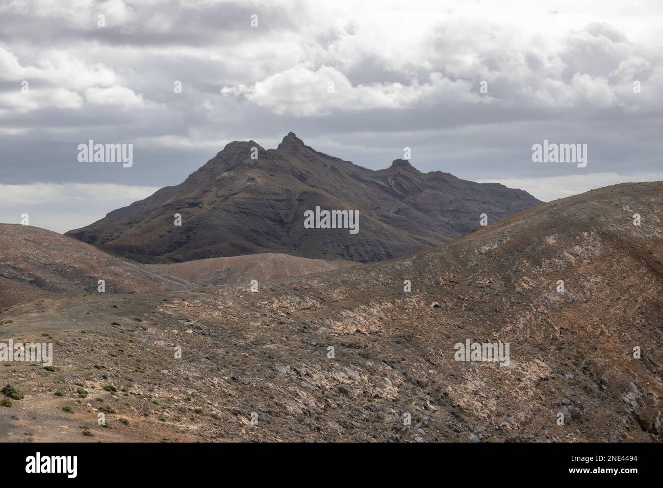 Shapes and lines of the mountains of the volcanic origin. Light brown ...
