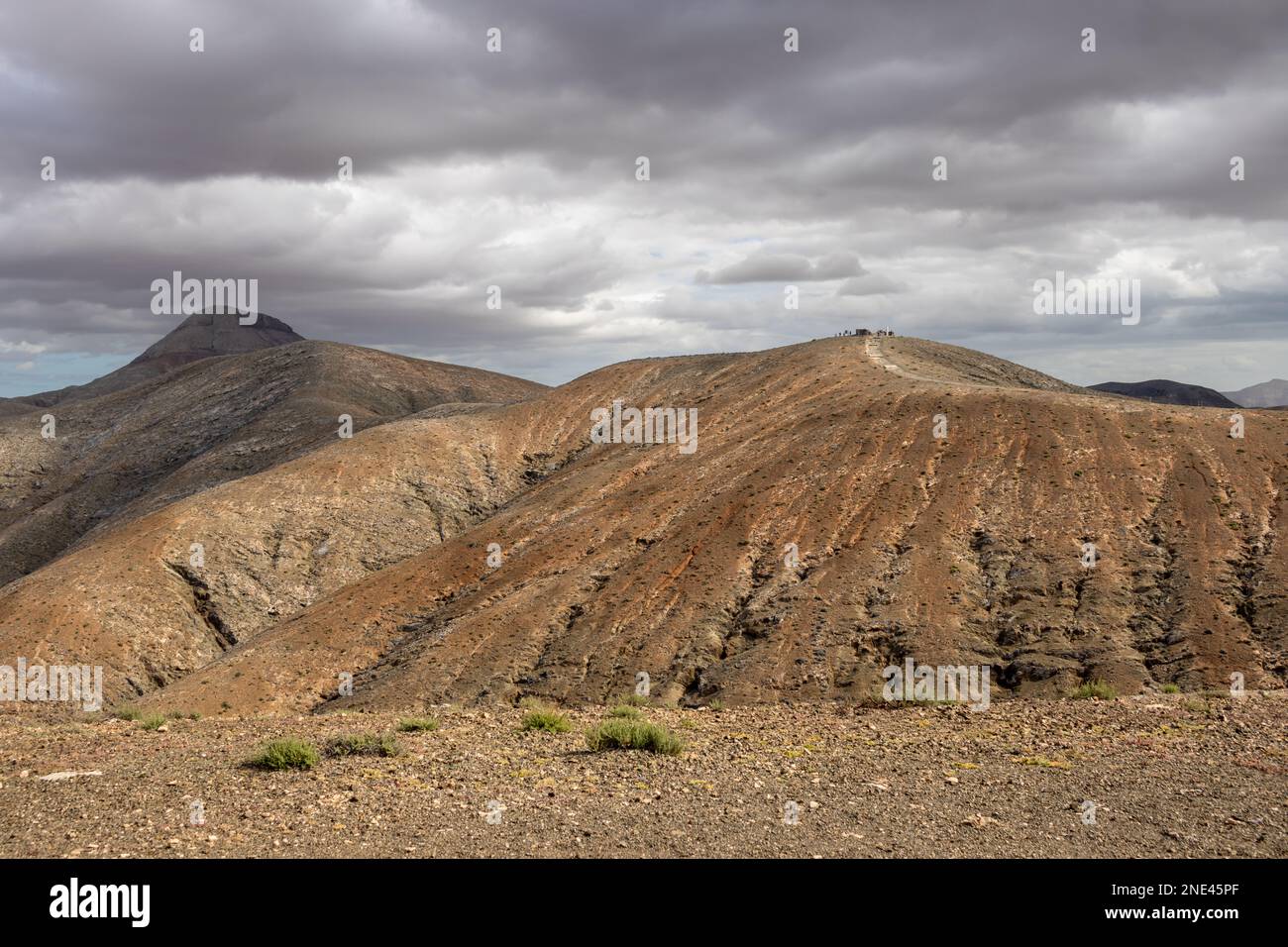 Shapes and lines of the mountains of the volcanic origin. Light brown ...