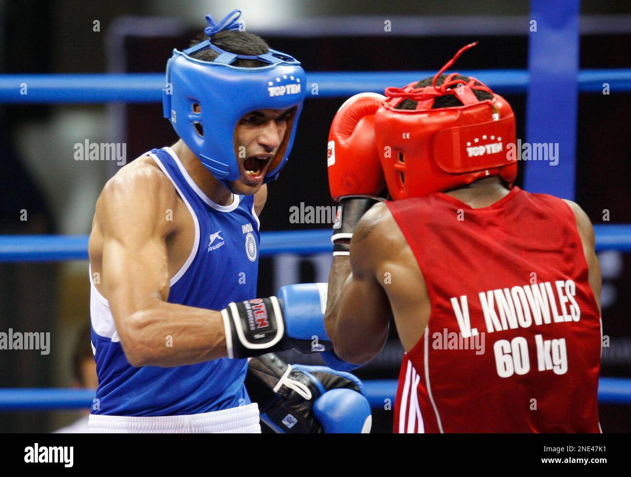 Indian boxer Jai Bhagwan, left, fights against Valention Knowles of ...