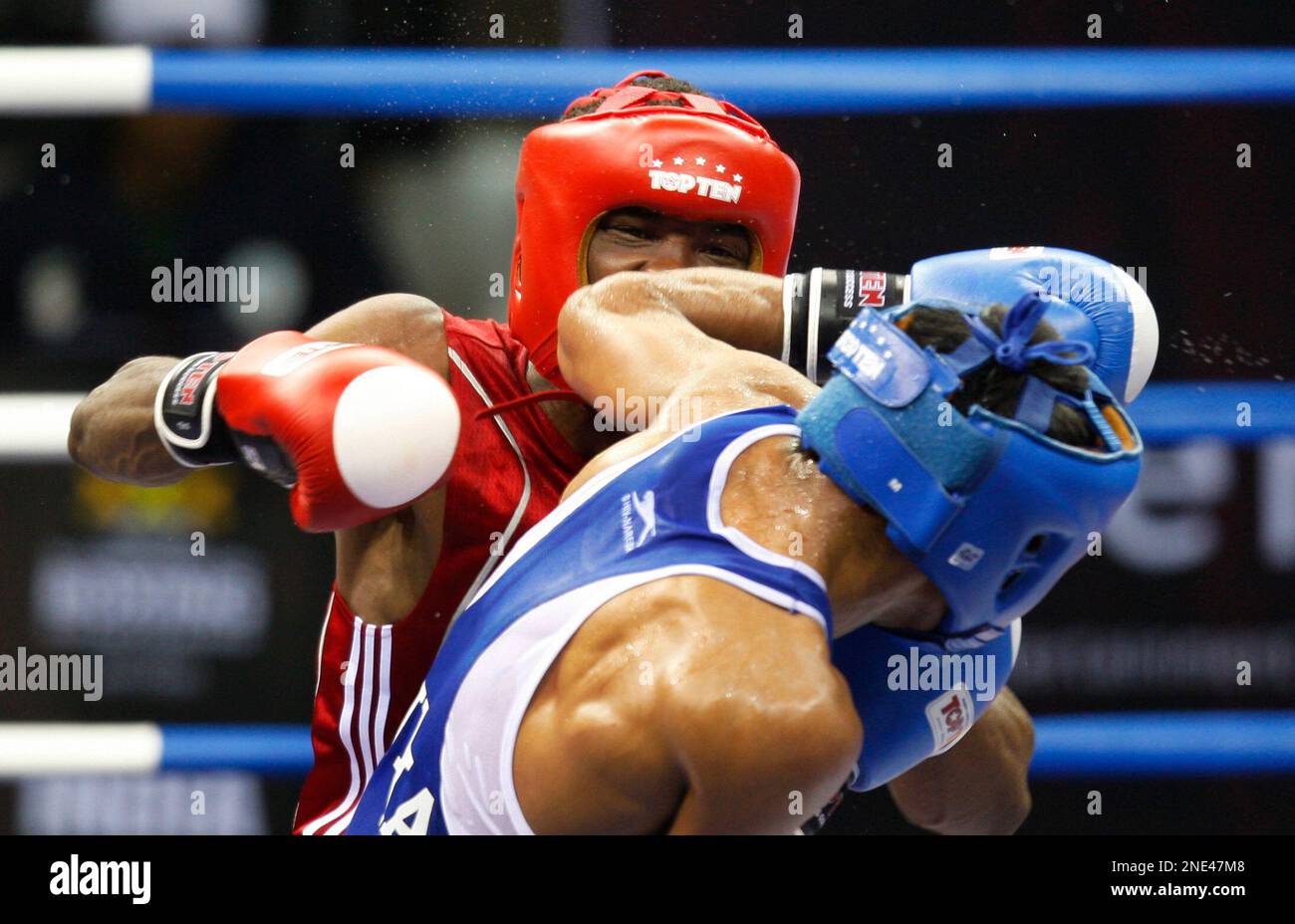 Indian boxer Jai Bhagwan, right, fights against Valention Knowles of ...