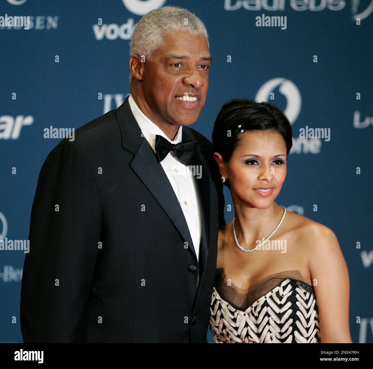 Retired American basketball player Julius Erving,left,arrives with his ...