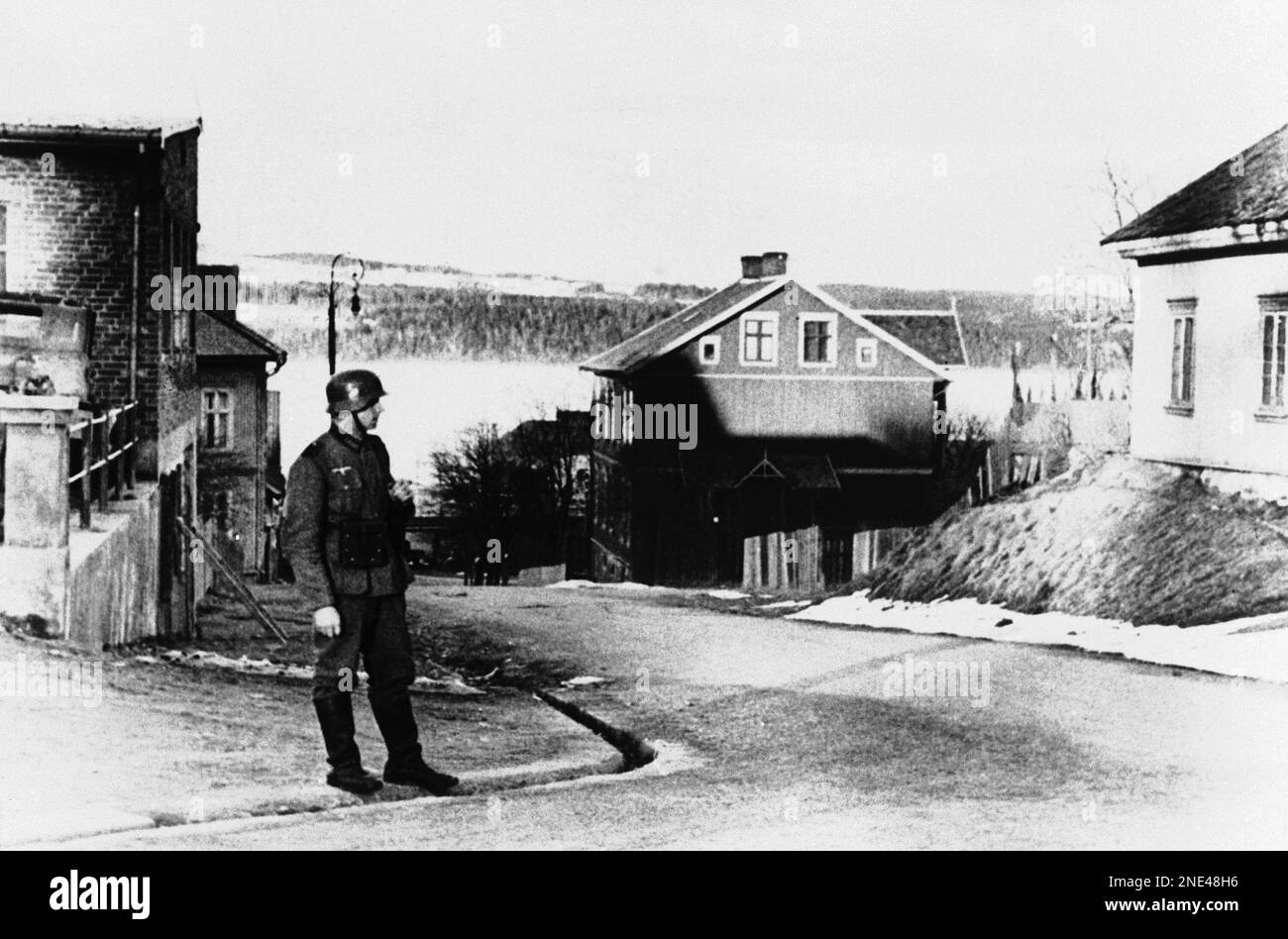 A German sentry guarding the crossing in a village, Norway, on Aug. 31 ...