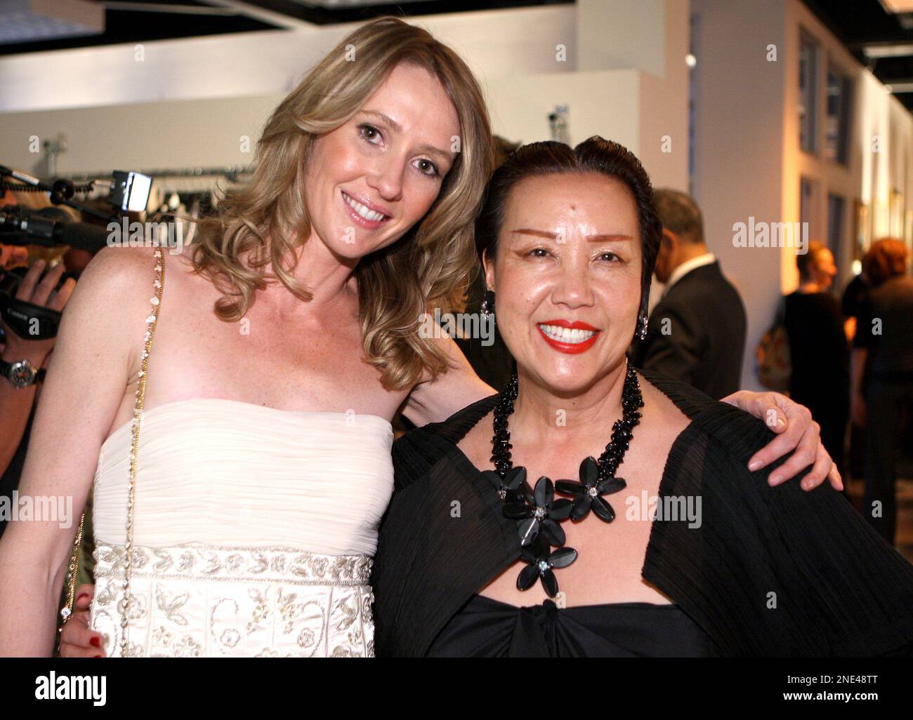 Designer Sue Wong (R) and actress Alexandra Leighton attend the Sue ...