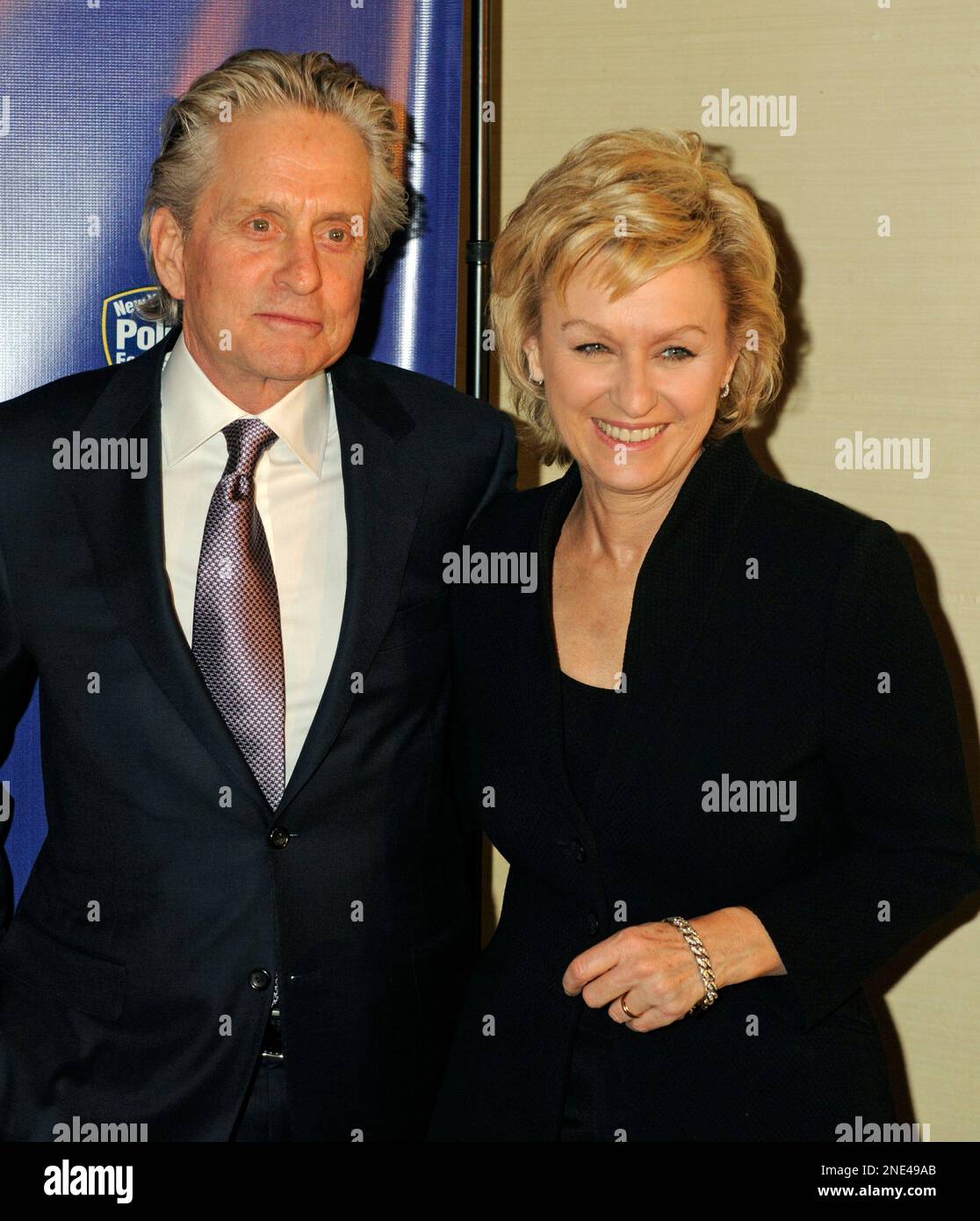 Michael Douglas, left, and journalist Tina Brown pose for photos upon ...