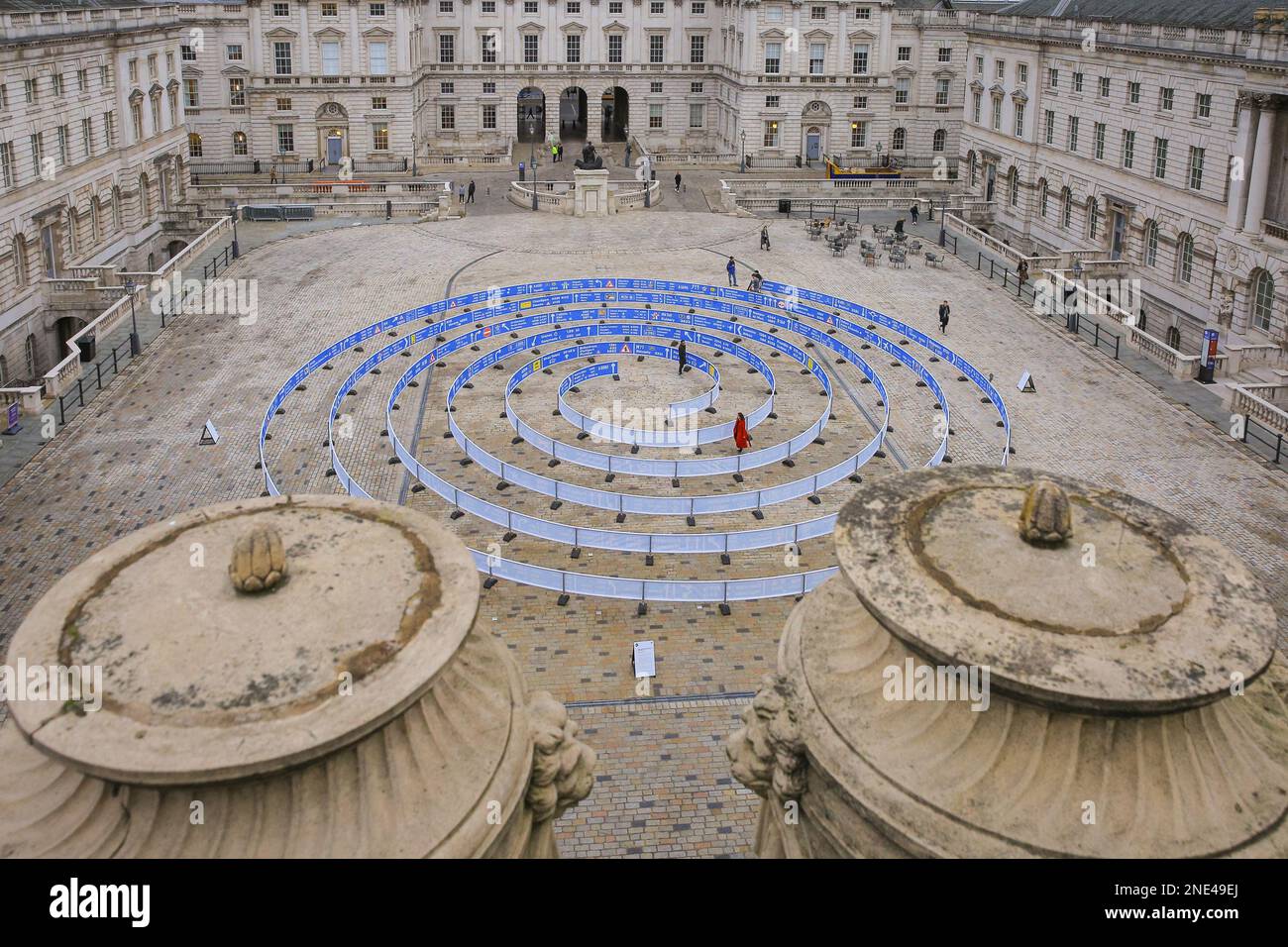 London, UK. 16th Feb, 2023. Staff pose with the installation. Somerset House unveils a 30-metre ...