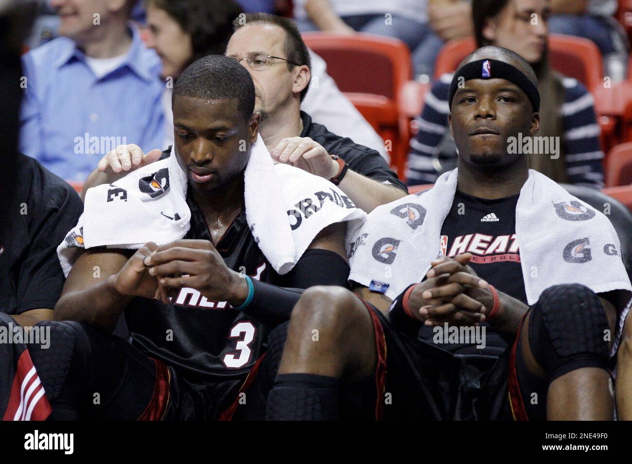 Miami Heat guard Dwyane Wade, left, and center Jermaine O'Neal, right ...