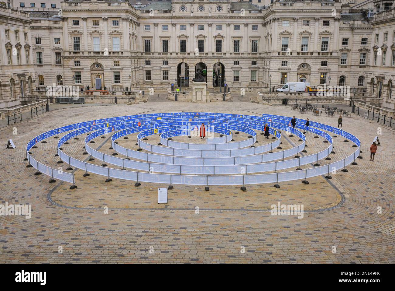 London, UK. 16th Feb, 2023. Staff pose with the installation. Somerset House unveils a 30-metre ...