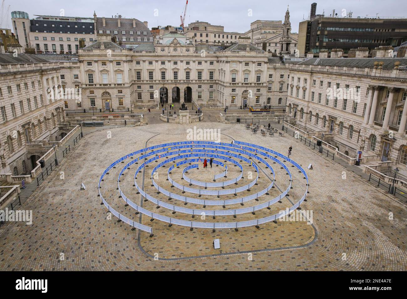 London, UK. 16th Feb, 2023. Staff pose with the installation. Somerset House unveils a 30-metre ...