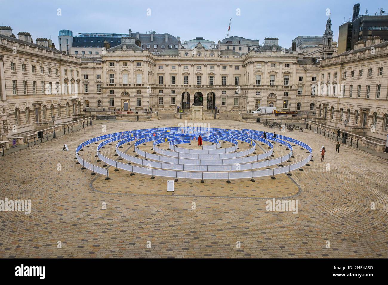London, UK. 16th Feb, 2023. Staff pose with the installation. Somerset House unveils a 30-metre ...