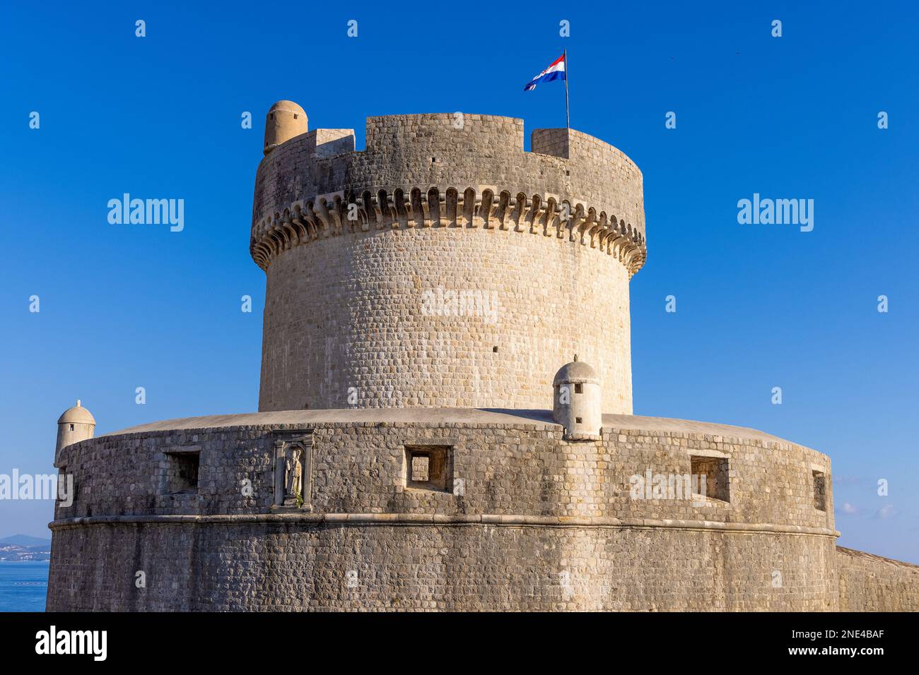 Old walls and towers in the historic old town of Dubrovnik, Croatia ...