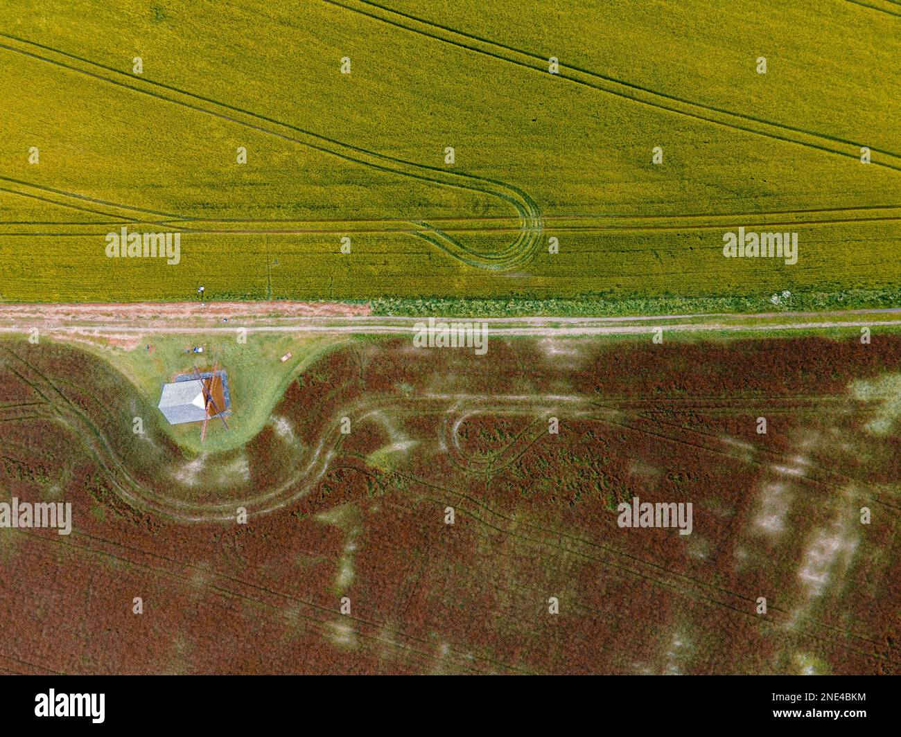 A top view of a small house surrounded by farm lands Stock Photo - Alamy