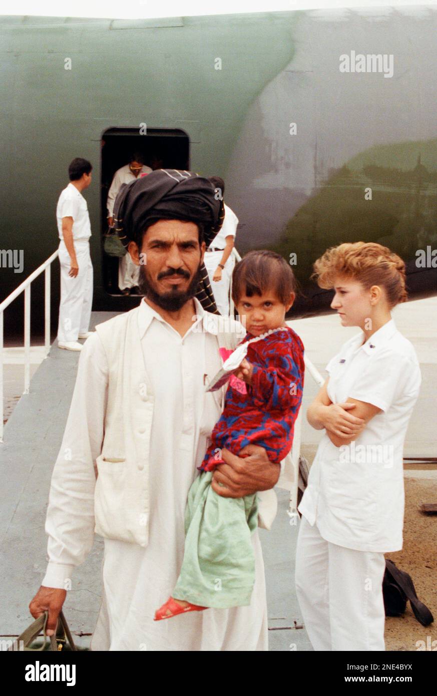 Three-year-old Masuma Khan arrives at Andrews Air Force Base, Maryland on Sept. 26, 1989 in the ...