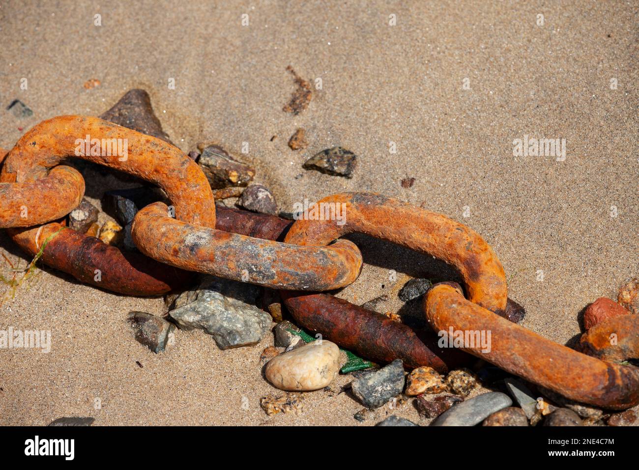 Rusty steel in sand hi-res stock photography and images - Alamy
