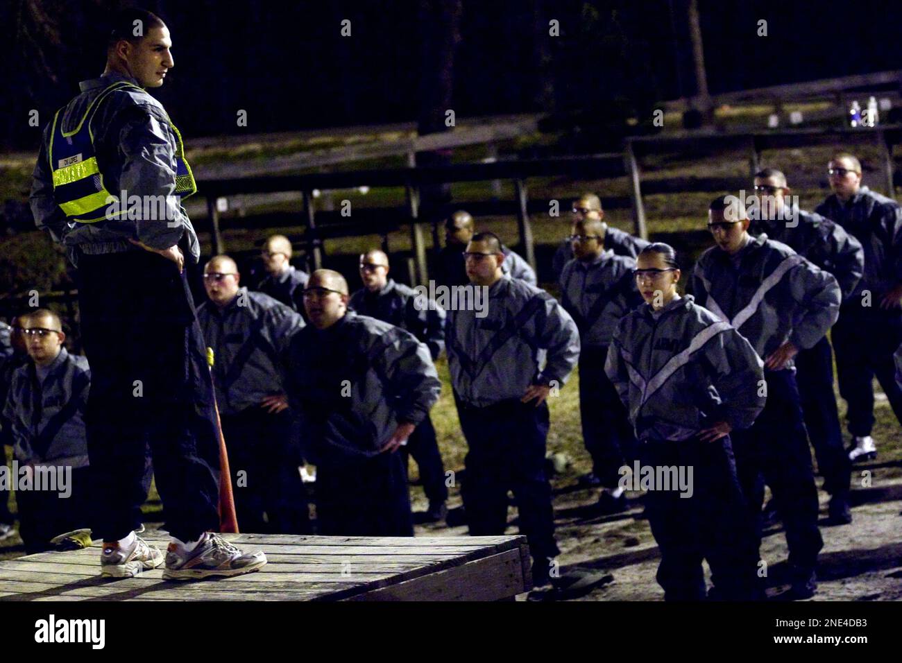 Drill Sergeant Adan Lopez, left, looks over Second Platoon, as he ...