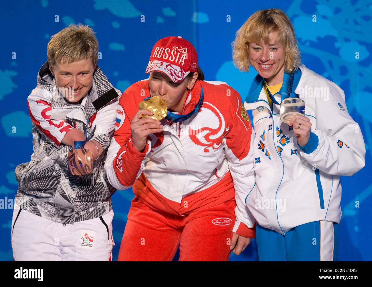 From left, Katarzyna Rogowiec of Poland, celebrates her bronze medal ...