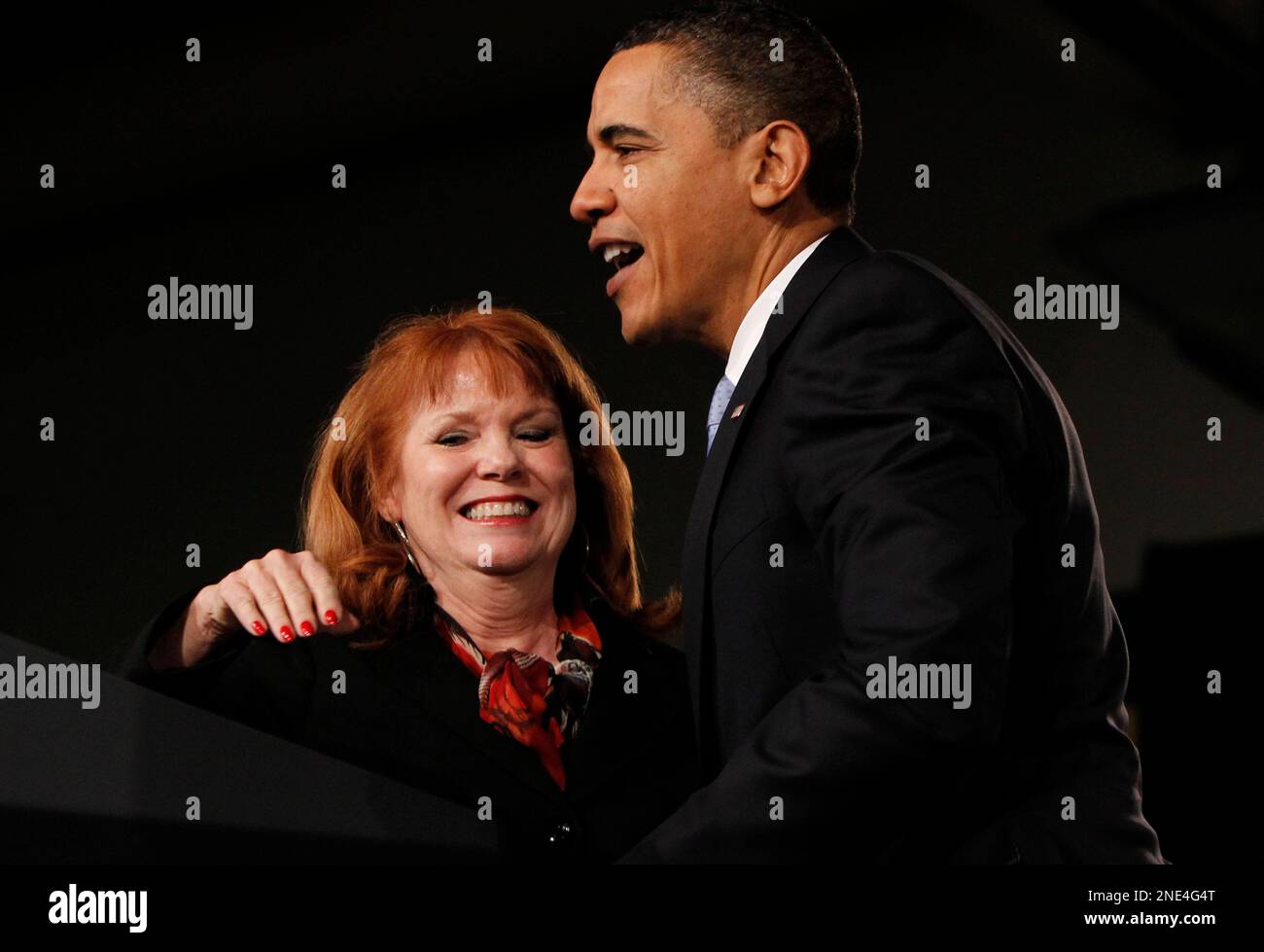 President Barack Obama is introduced by Connie Anderson, sister of ...