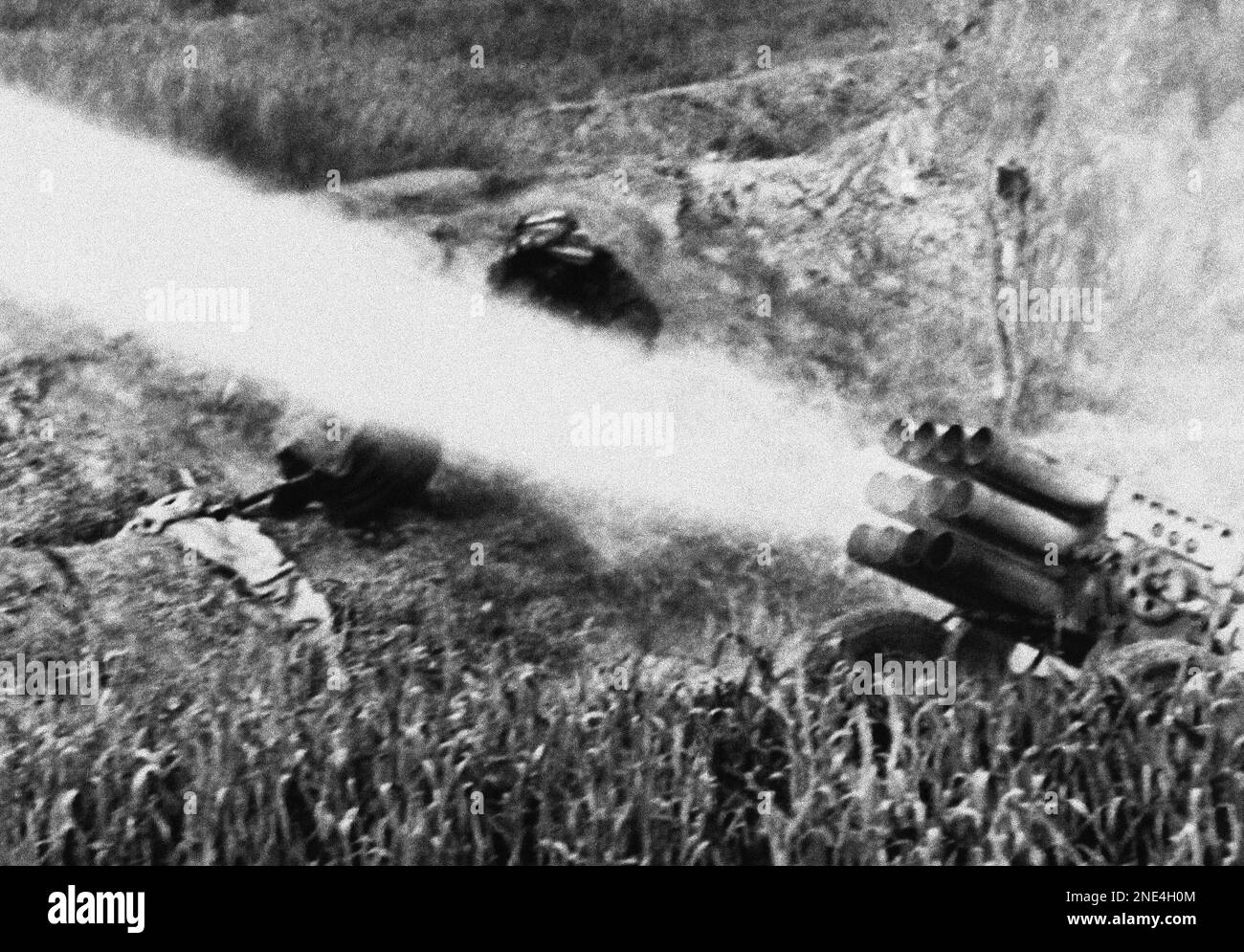 A huge flame streaks from a BM-12 multi-barrelled rocket launcher as ...