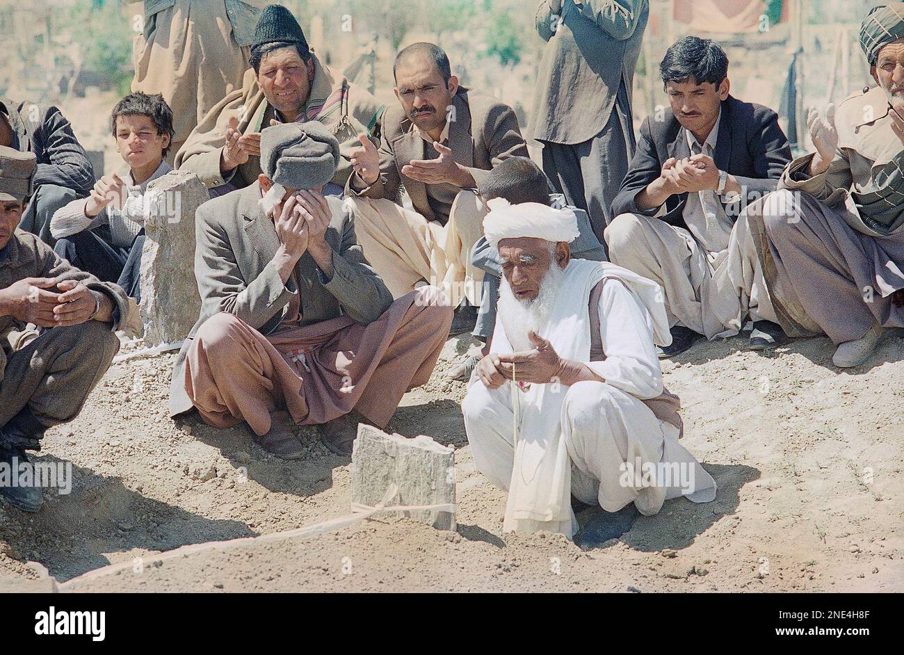Aziz Masjidi grieves for his two daughters, Assiba, 8, and Anahita, 12 ...