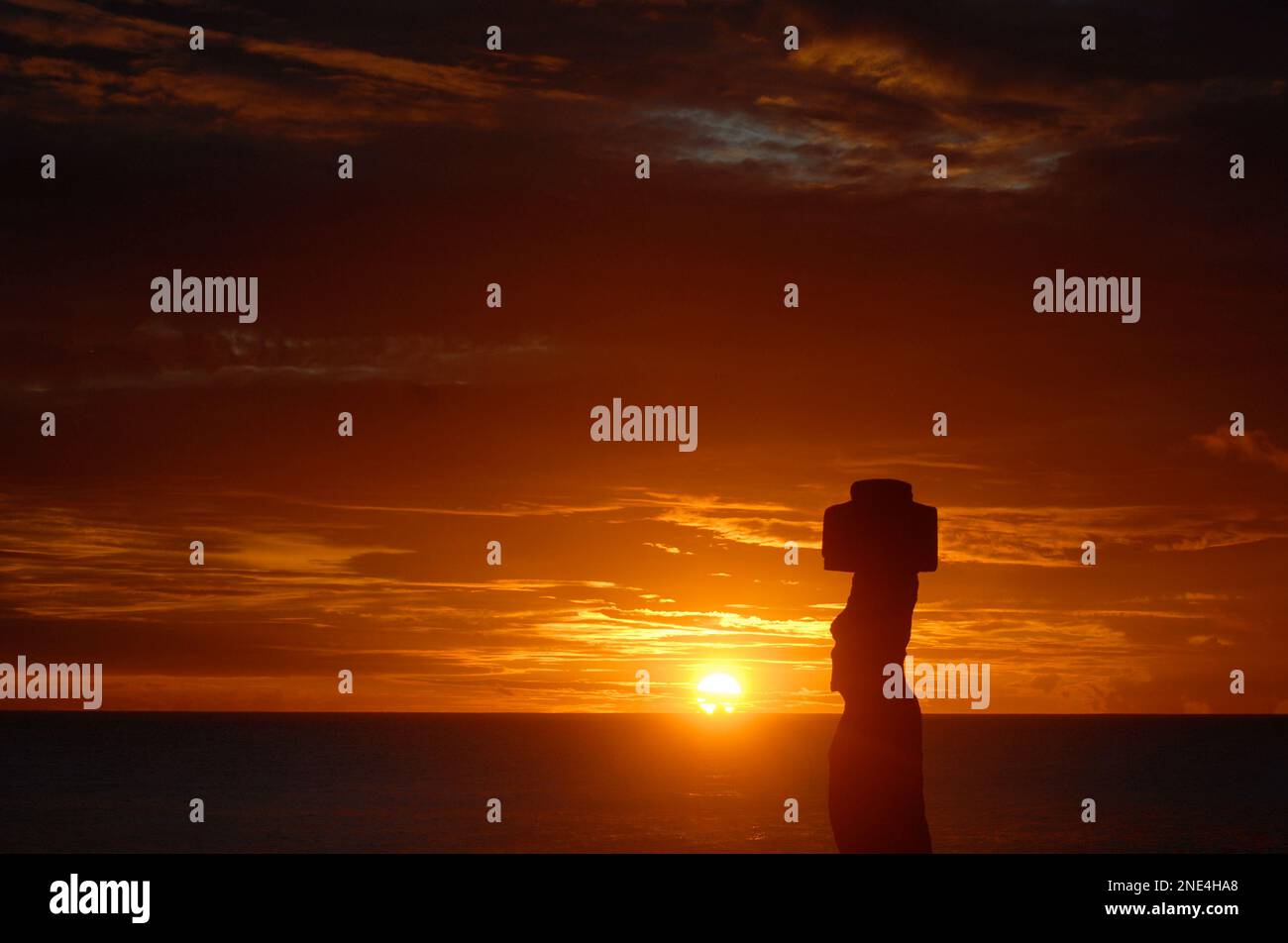 Moai at sunset, Ahu Tahai, Hanga Roa, Pasqua island, Chile Stock Photo ...