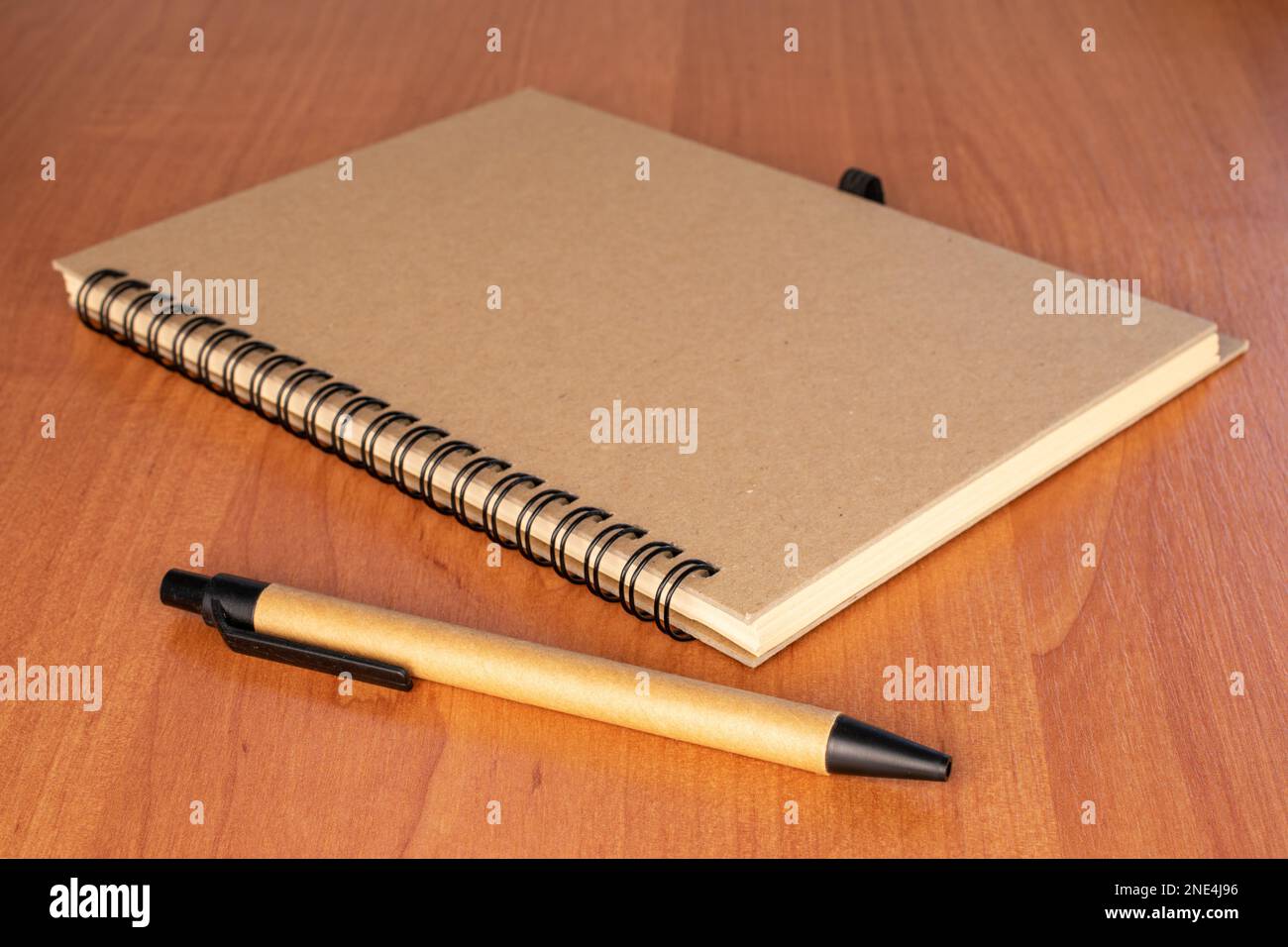 One notebook and pencil on the office desk, close-up Stock Photo - Alamy
