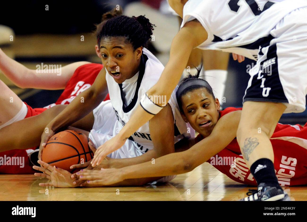 Long Island University's Connie James, left, and St. Francis's Brittany ...