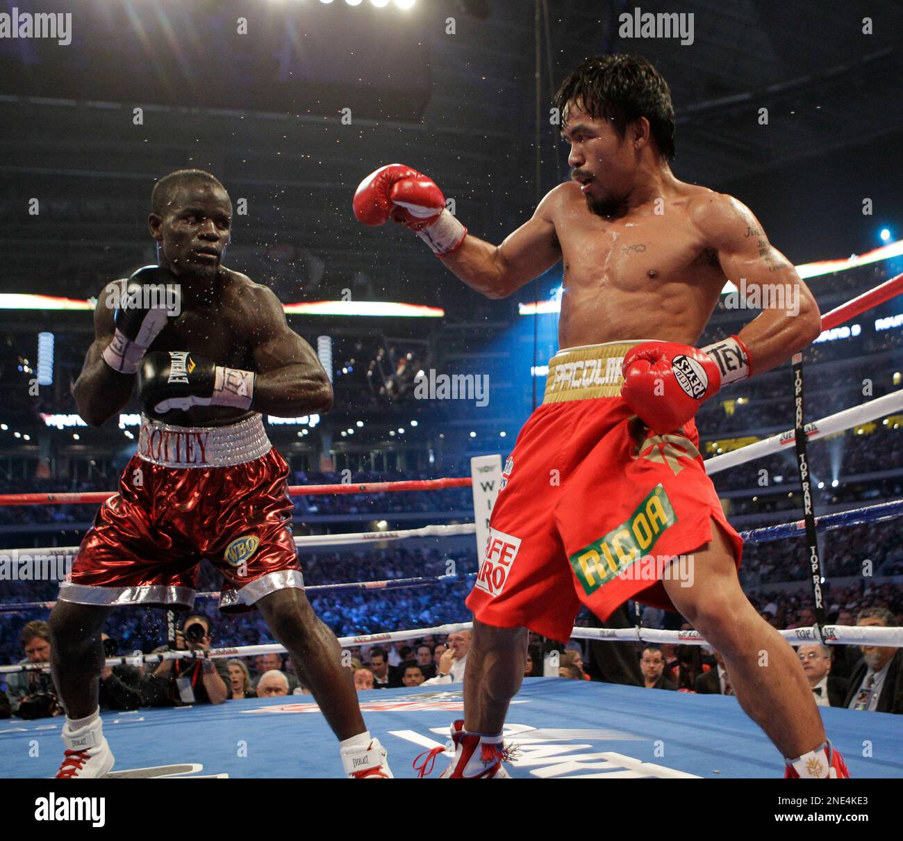 Manny Pacquiao, of the Philippines, Joshua Clottey, from Ghana, during ...