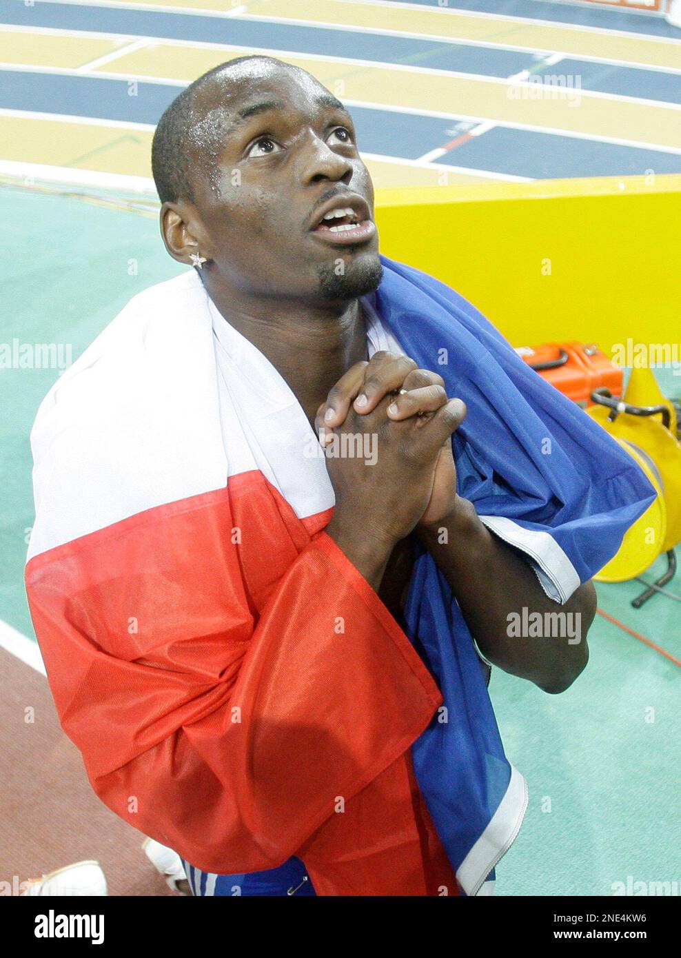 Teddy Tamgho of France celebrates after setting an indoor world record ...