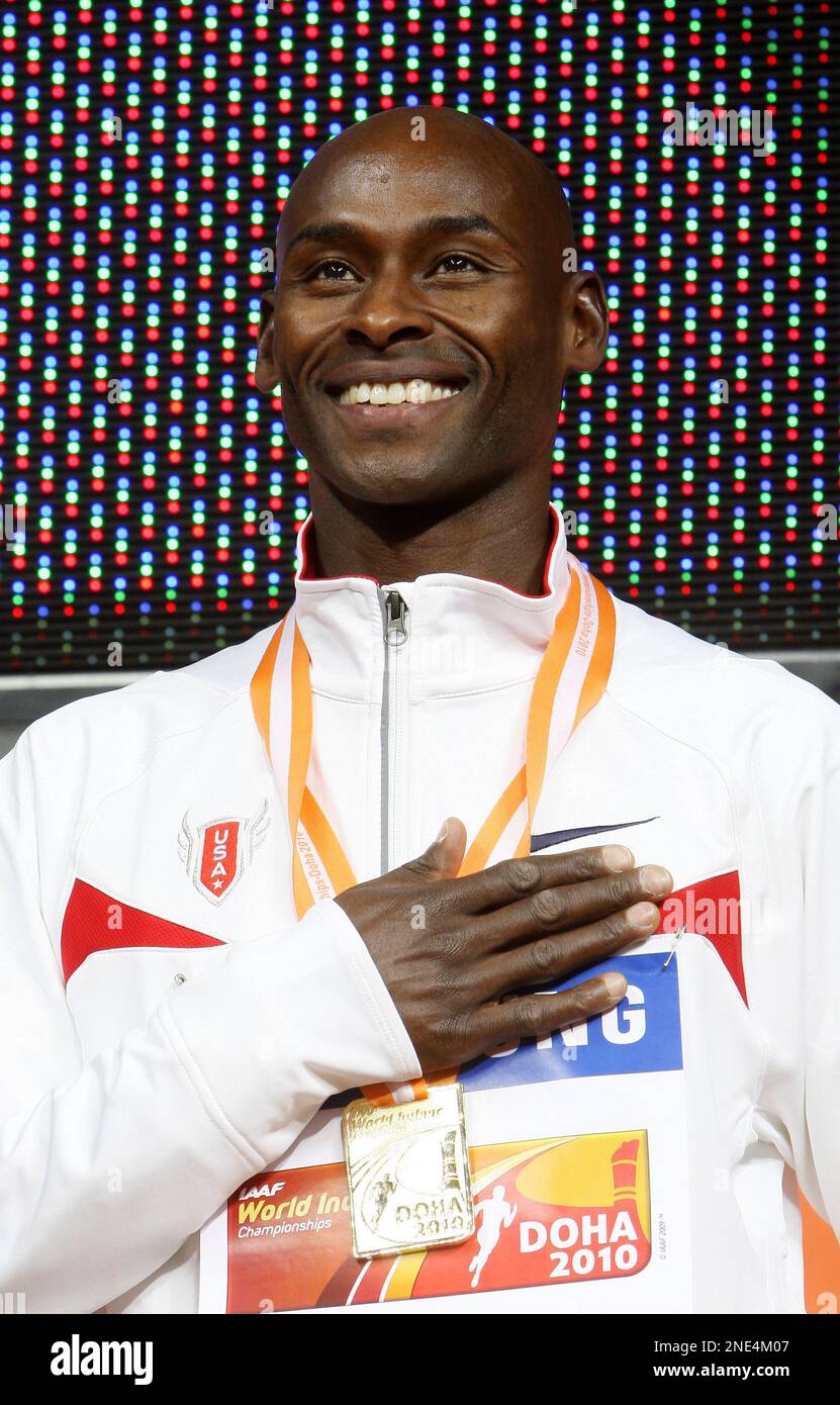 United States' gold medalist Bernard Lagat reacts during ceremony for ...