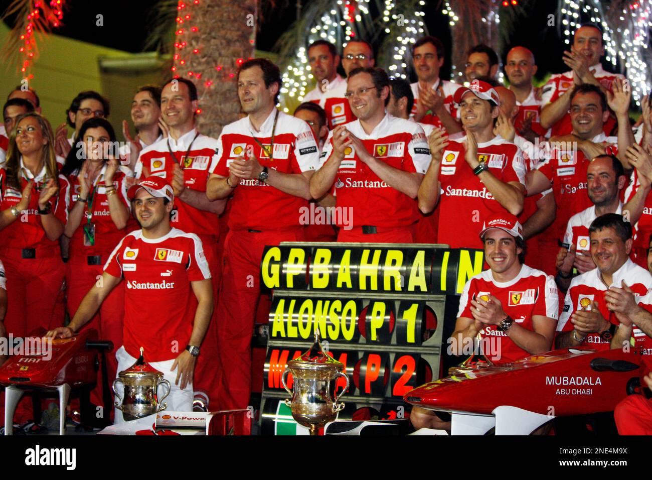 Ferrari team celebrate in the paddock after the Formula One Bahrain ...