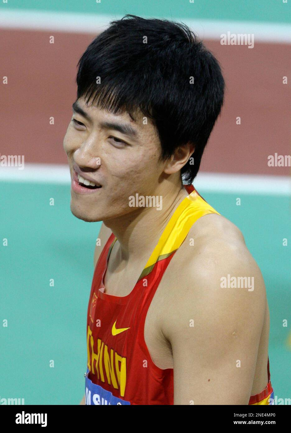 China's Liu Xiang reacts after his Men's 60m hurdles semi final at the ...