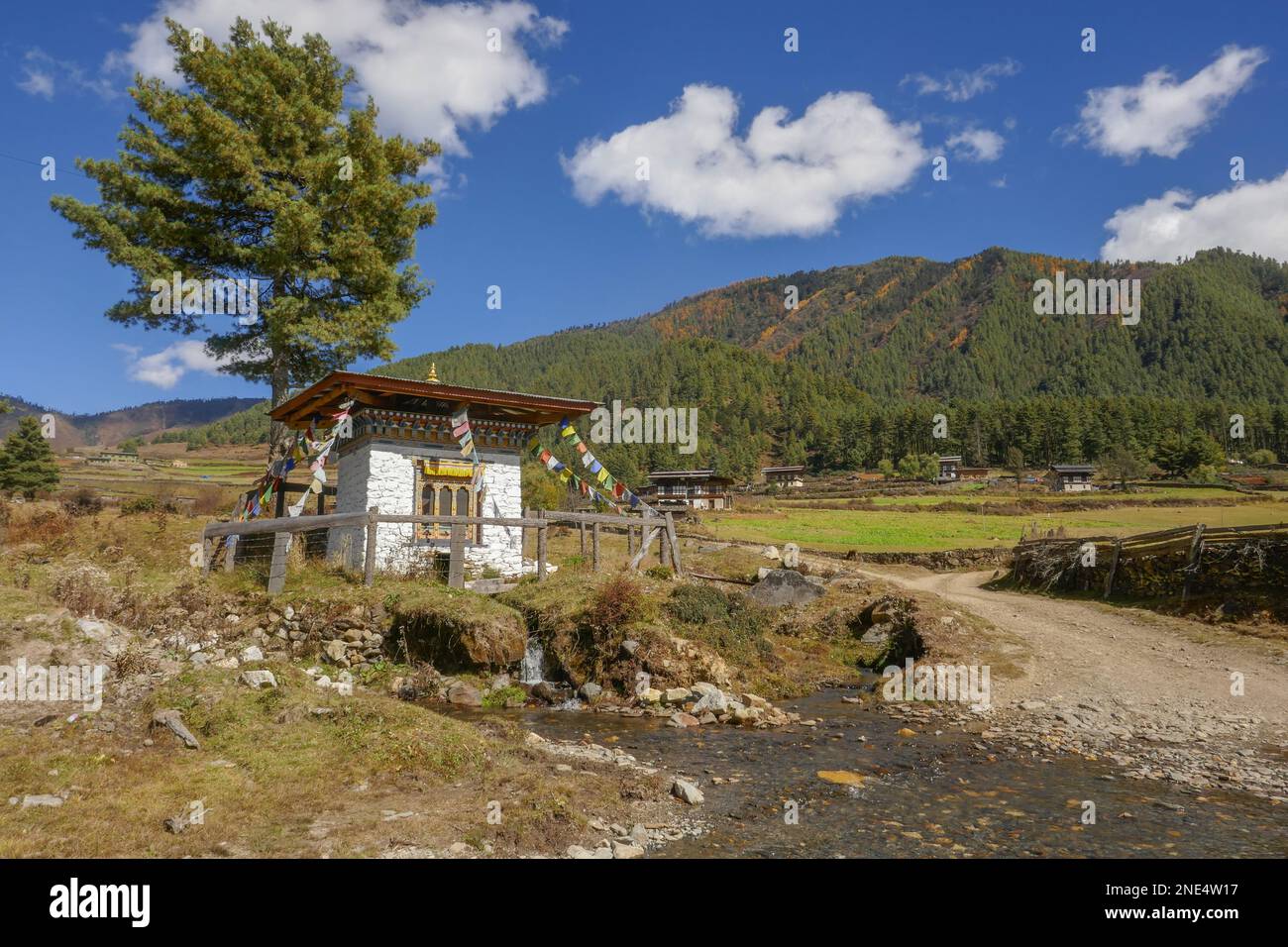 Landscape view with traditional water powered prayer mill in the ...