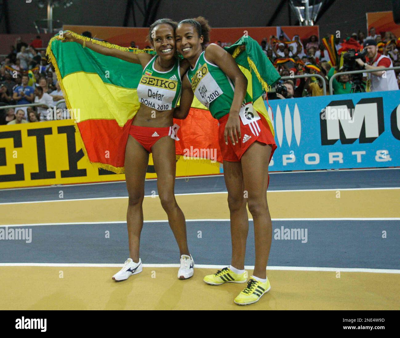 Ethiopia's Meseret Defar, left, the gold medalist celebrates with her ...