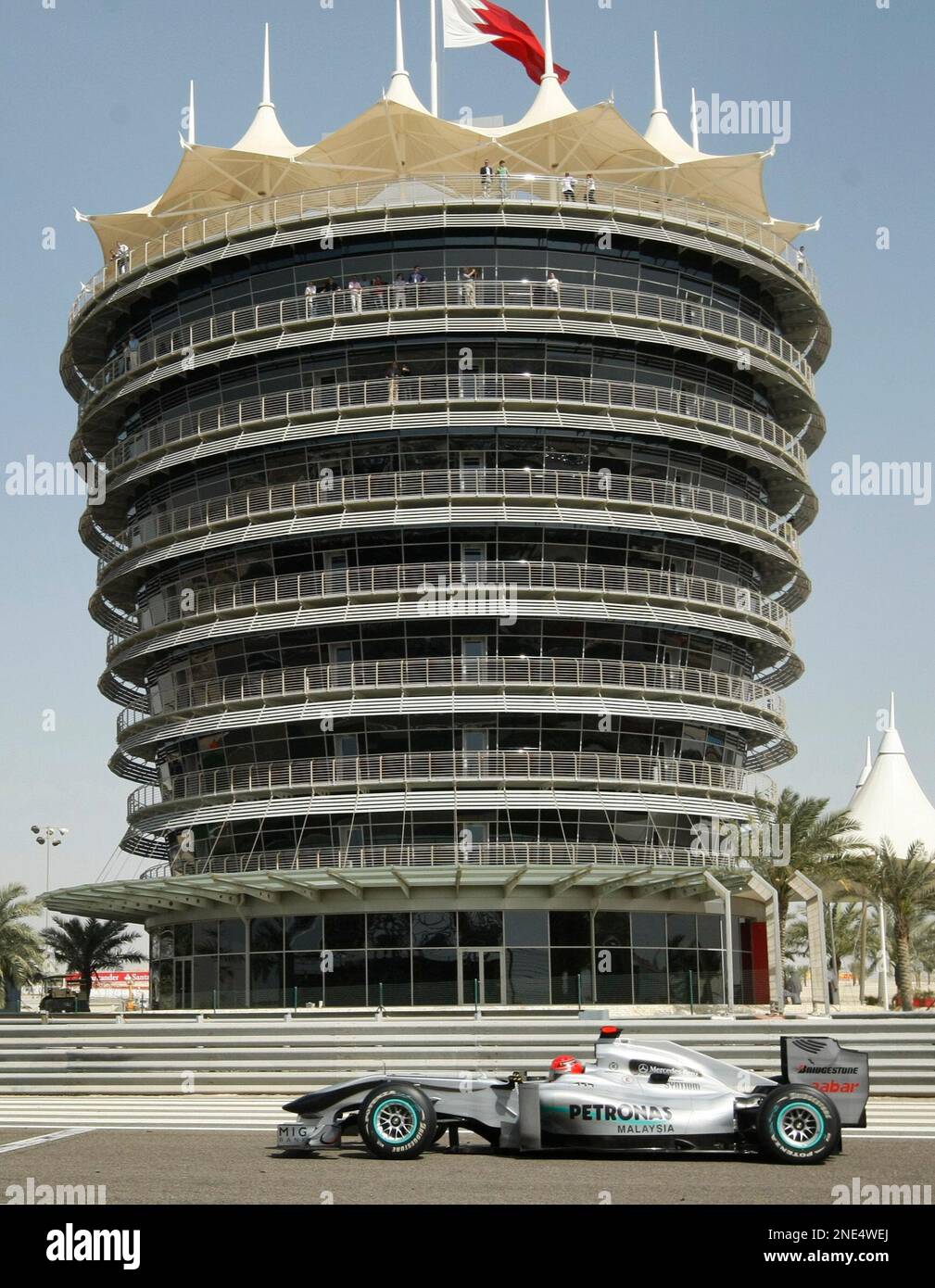 Mercedes Grand Prix driver Michael Schumacher of Germany passes the VIP ...