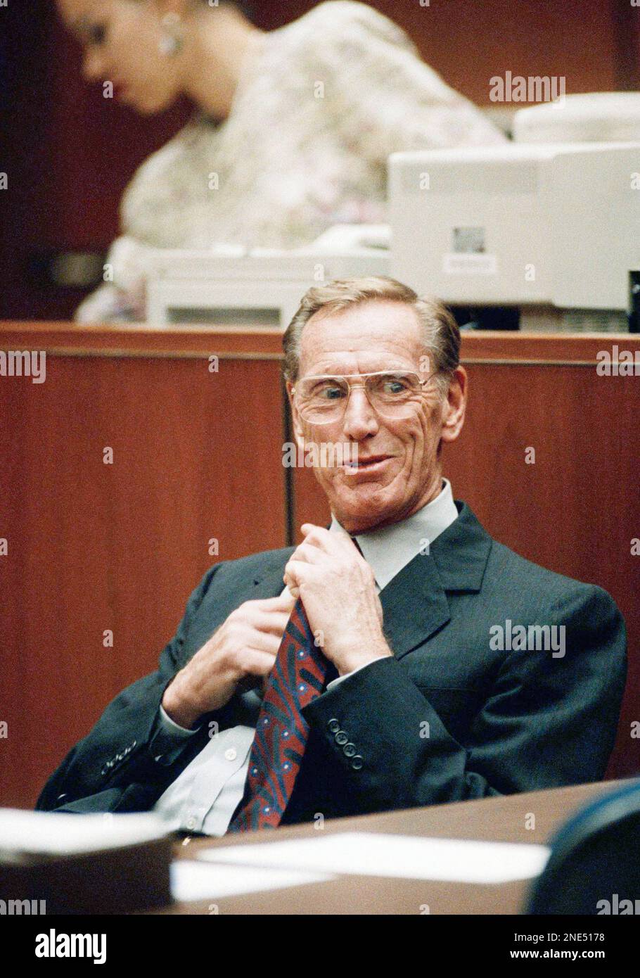 Charles Keating Jr Adjusts His Tie As He Sits In Los Angeles Courtroom