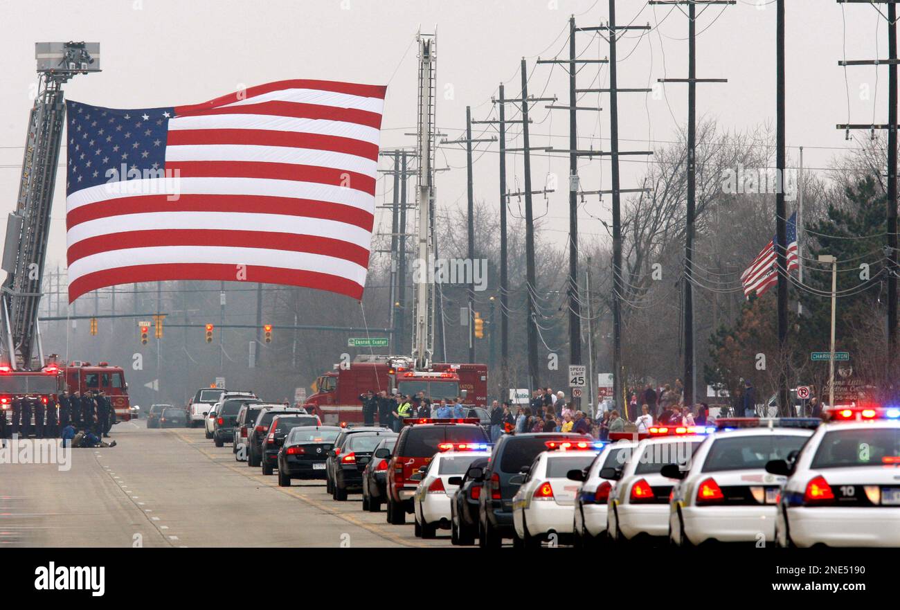 The funeral procession for slain police officer James Bonneau makes its ...