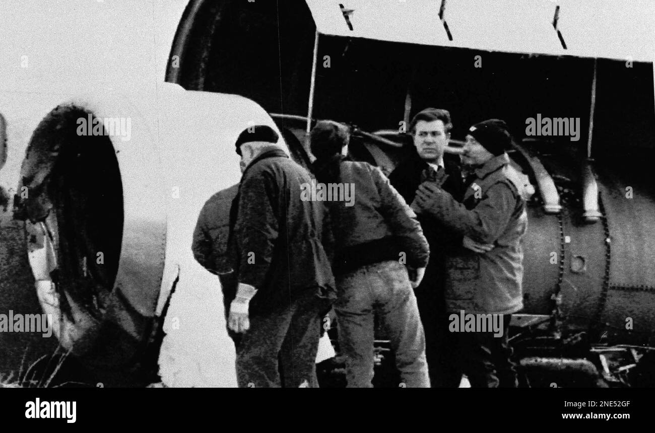 Stefan Rasmussen, second from right, facing camera, the pilot who was ...