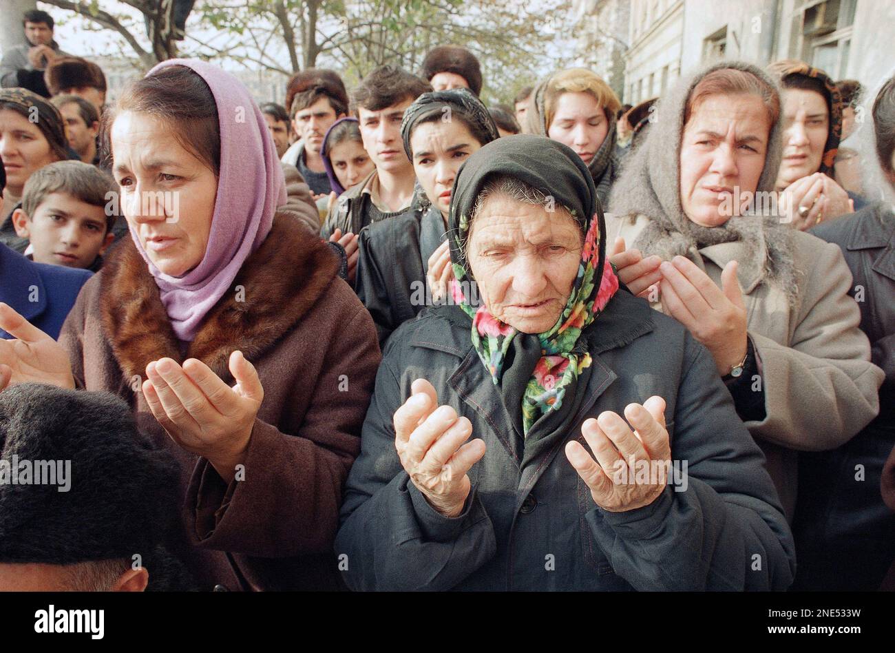 Chechen women pray during a rally in Grozny on Sunday, Nov. 11, 1991 ...
