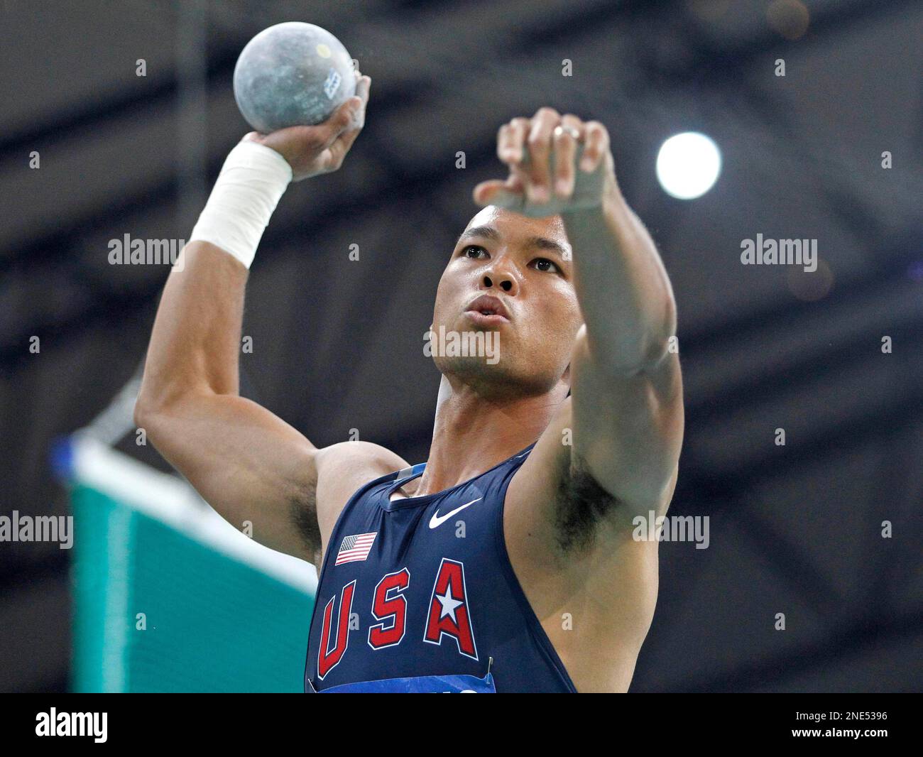 Bryan Clay of the United States competes in Men's heptathlon shot put ...