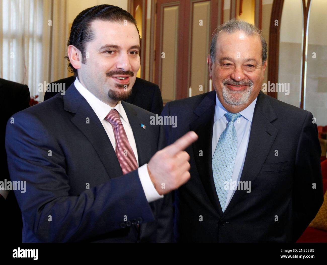 Lebanese Prime Minister Saad Hariri, left, gestures as he receives ...