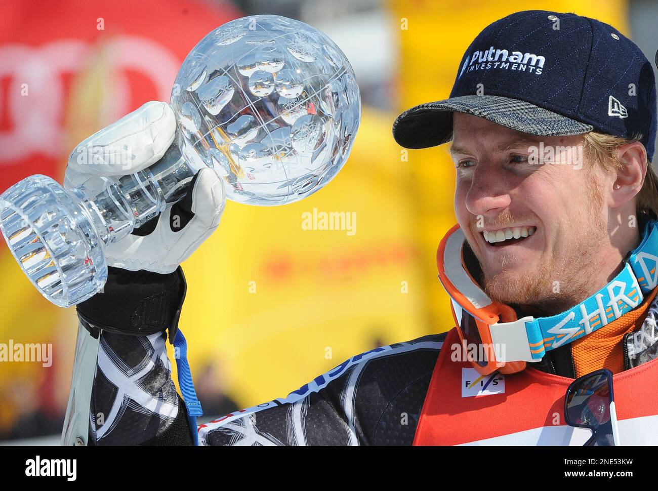Ted Ligety of the United States shows the trophy of the alpine ski, Men ...